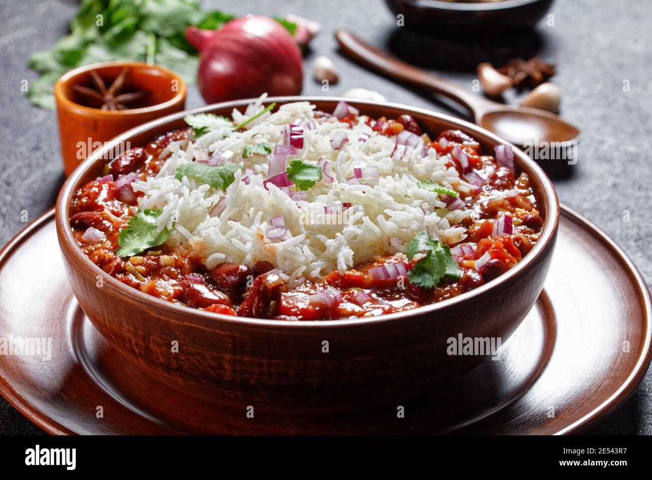 Rajma red bean masala, red bean kidney curry, with rice in a clay bowl ...