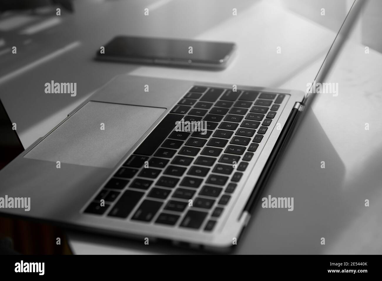 Modern office workplace with laptop computer and smart phone hi-res ...