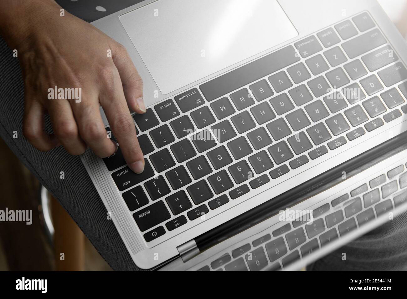 Top View. Finger pressing Enter key, Working on computer notebook Stock ...