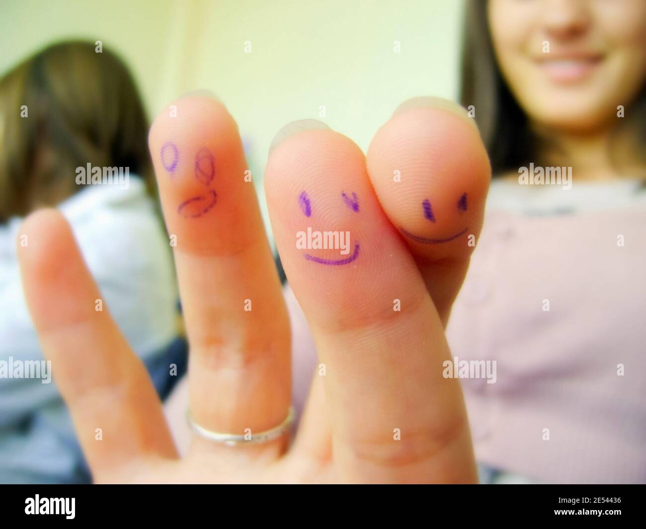 Child painted hand smile face hi-res stock photography and images - Alamy
