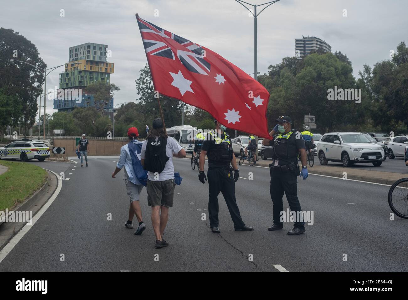 26 January 2021. The Peoples Australia Day Parade. Two men attempt to ...