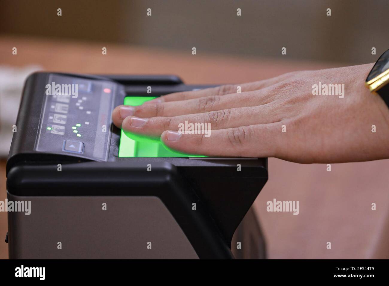 Baghdad, Iraq. 26th Jan, 2021. An Iraqi man gets his fingerprints ...