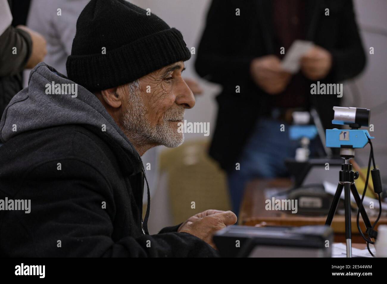Baghdad, Iraq. 26th Jan, 2021. An Iraqi man gets his picture taken ...