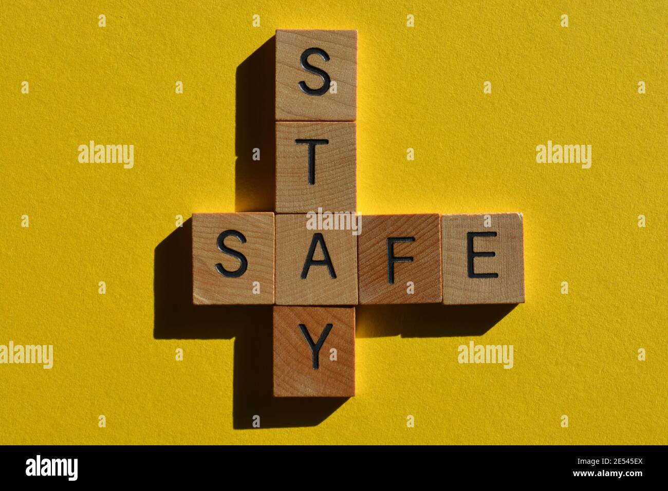 Stay Safe, words in wooden alphabet letters in crossword form isolated ... Stay Safe, words in wooden alphabet letters in crossword form isolated ...