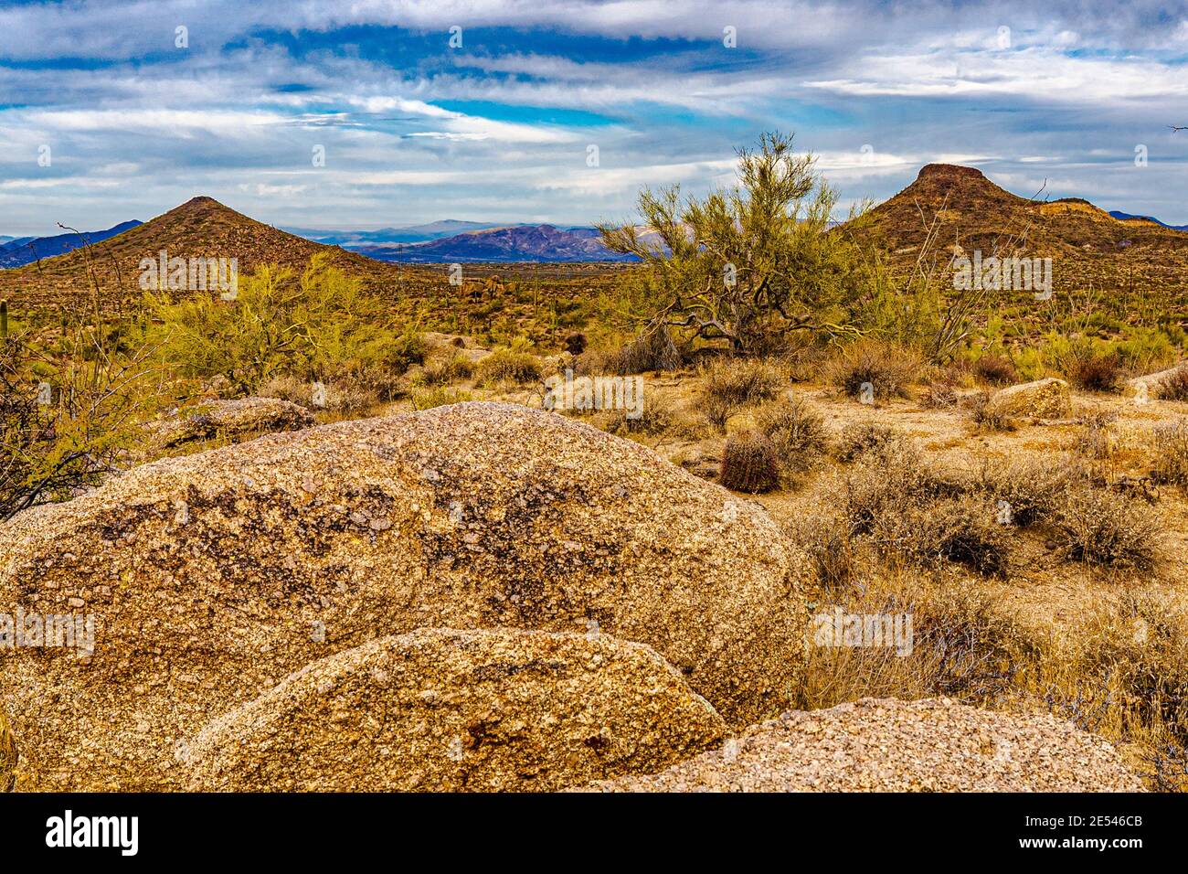 Boulders and desert mountains Stock Photo - Alamy
