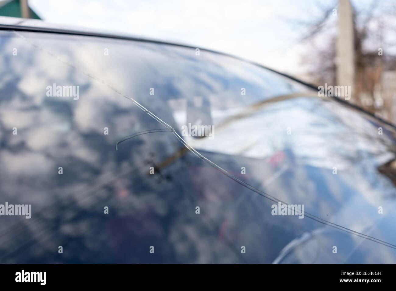 broken windshield with big crack through the glass, damaged car Stock ...