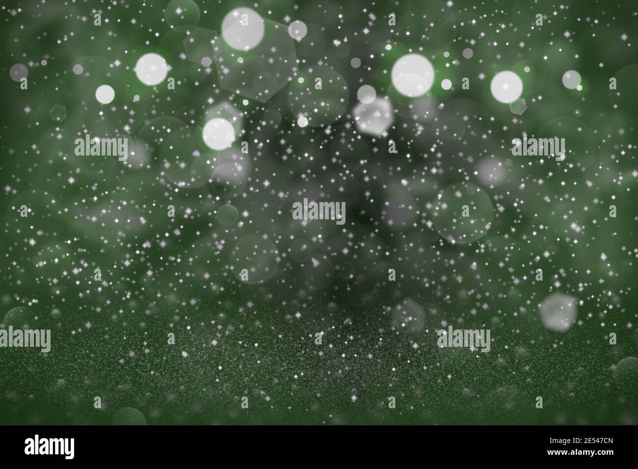 green nice sparkling abstract background glitter lights with sparks fly ...