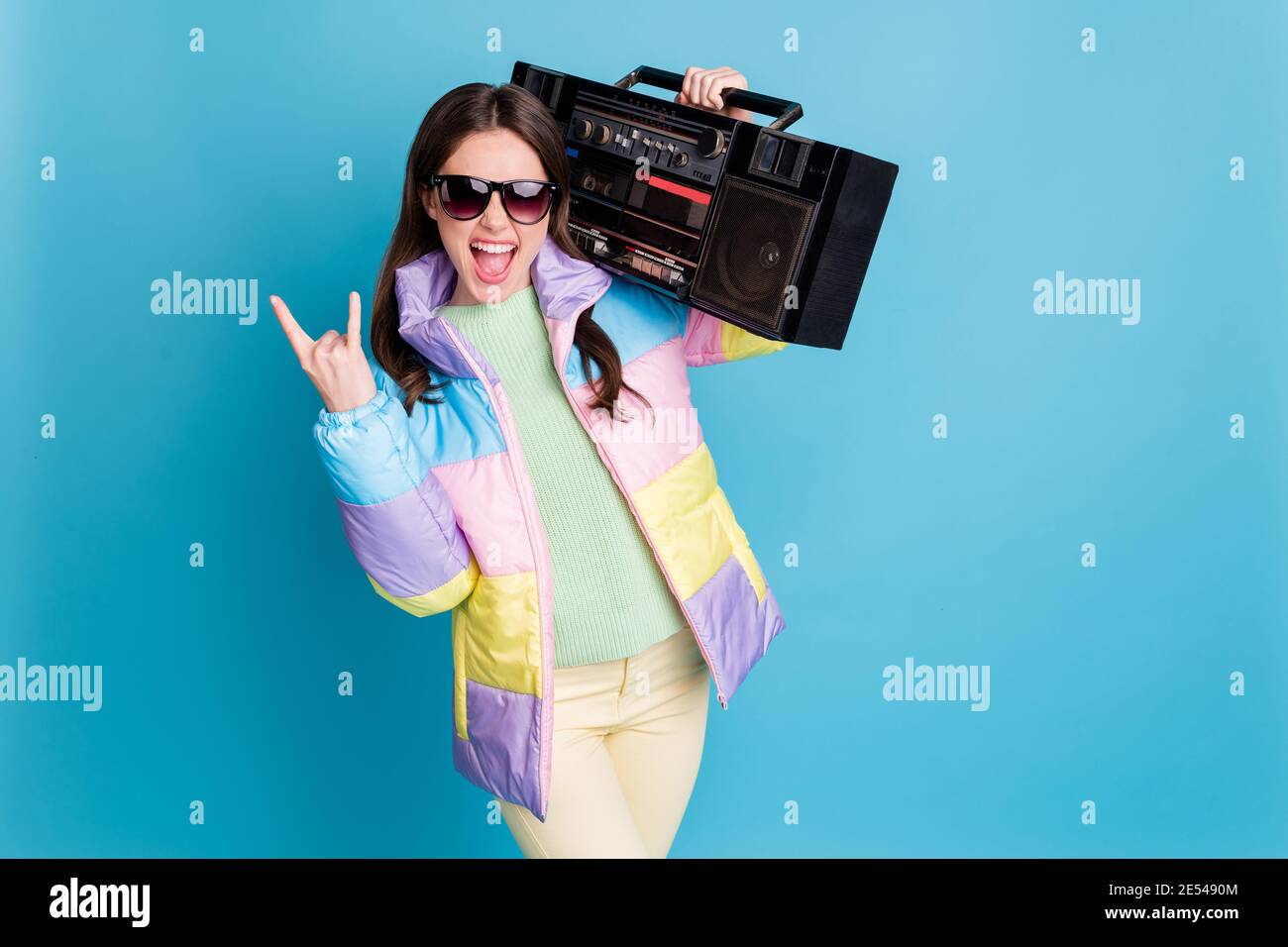 Photo portrait of woman showing rock goat sign with fingers holding ...