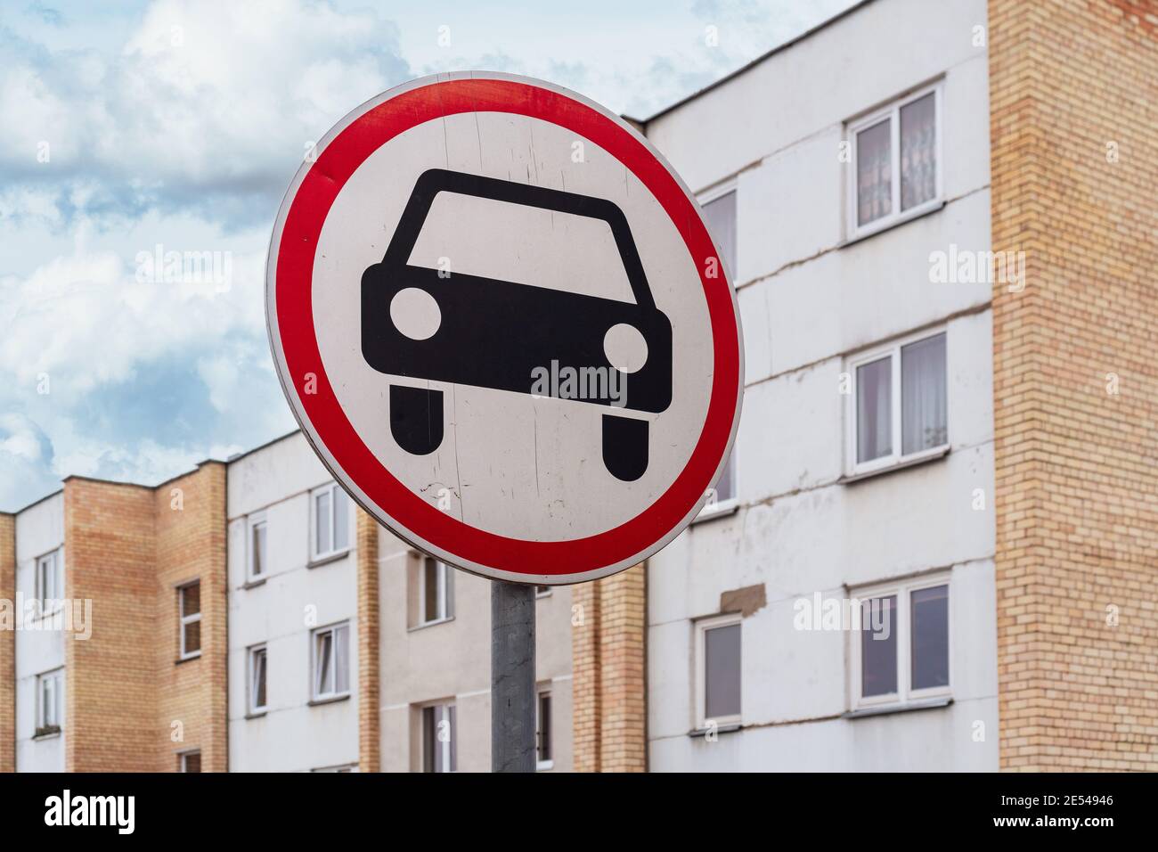 The no cars sign near the building with the window Stock Photo - Alamy