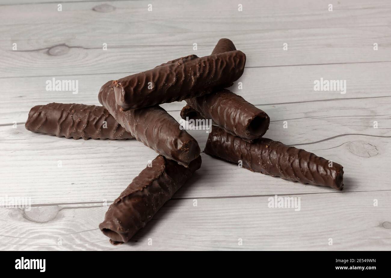 chocolate over a white table Stock Photo - Alamy