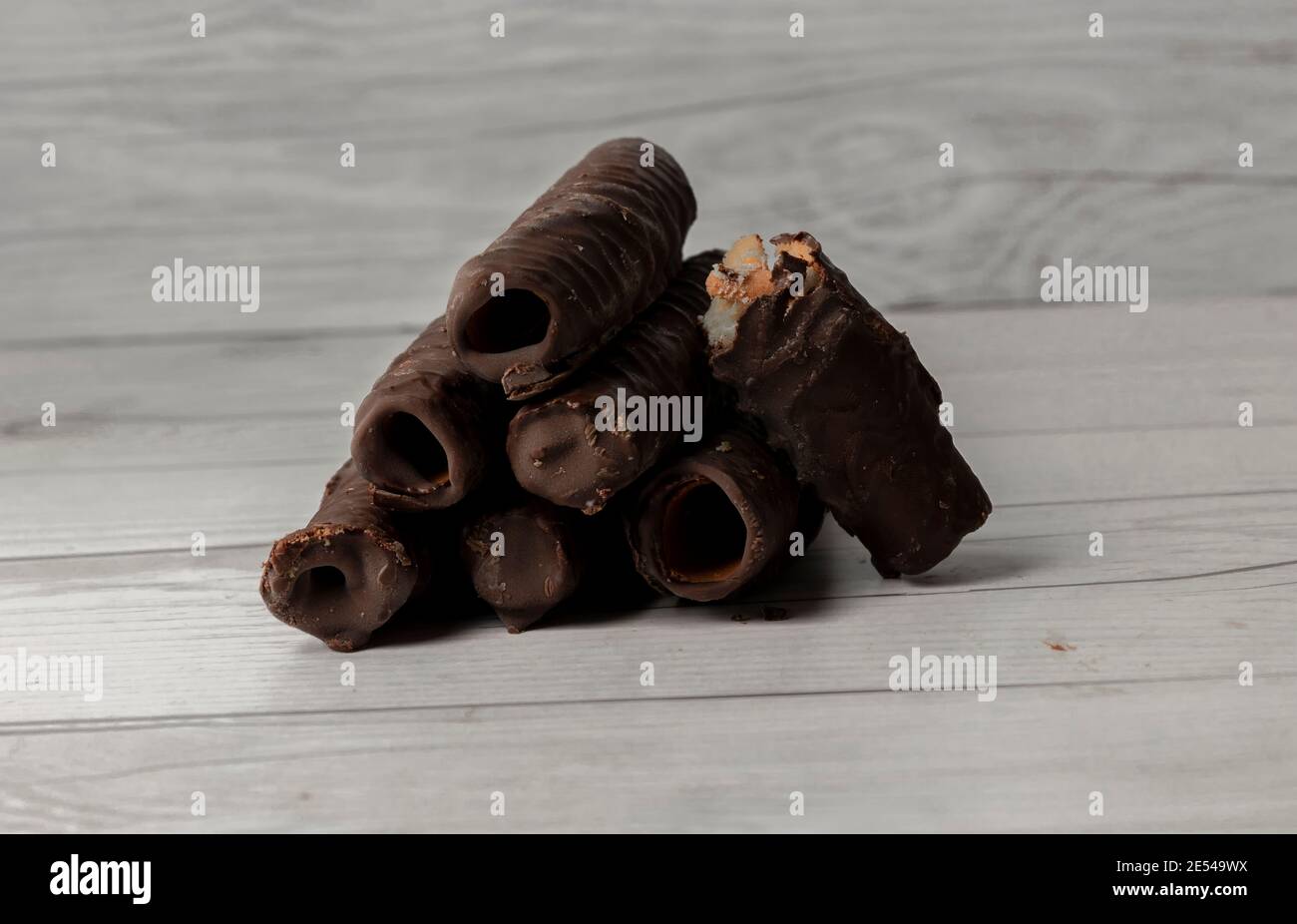 chocolate over a white table Stock Photo - Alamy