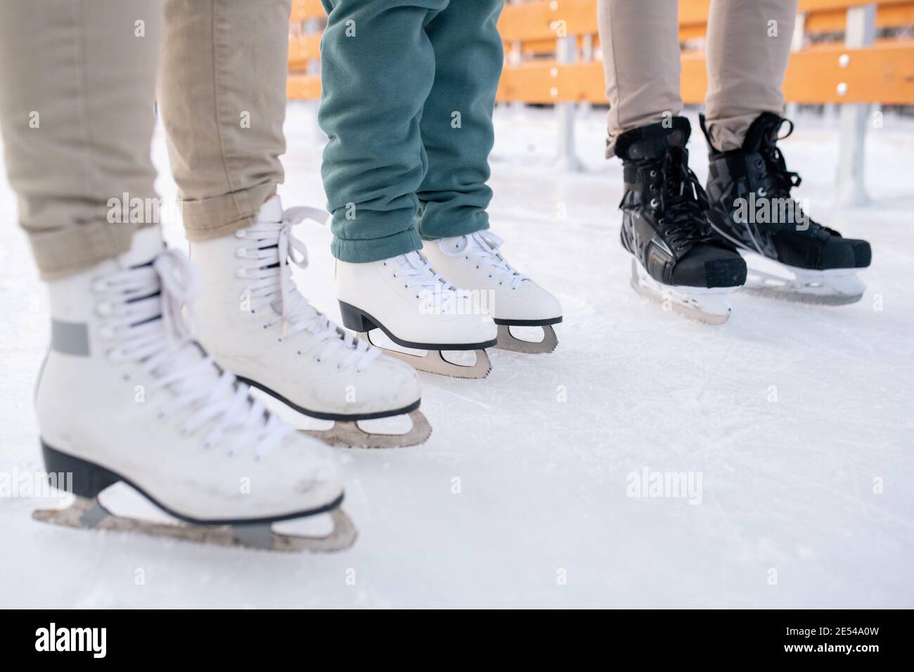 Close-up of people wearing skates on skating rink outdoors Stock Photo ...
