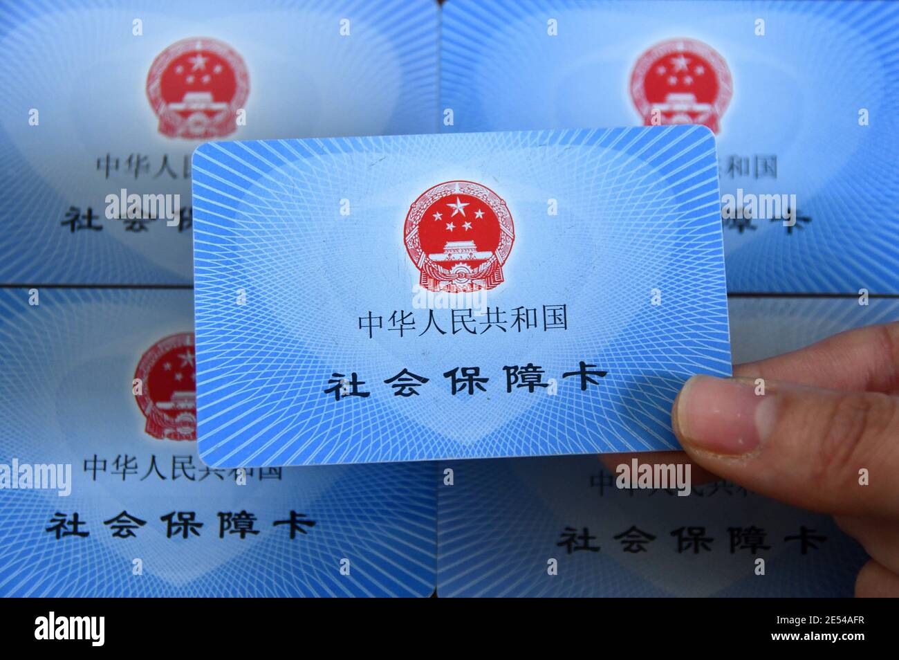HANDAN, CHINA - JANUARY 26, 2021 - A resident shows his social security ...
