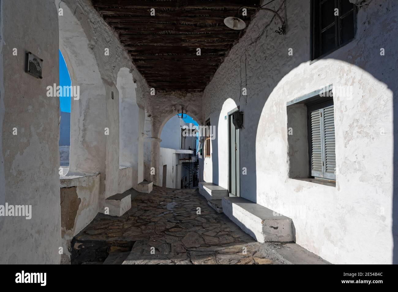 Buildings and narrow street of traditional architecture in Skyros ...