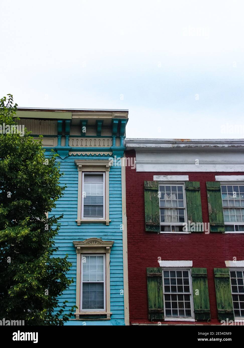 red and blue town house row Stock Photo - Alamy