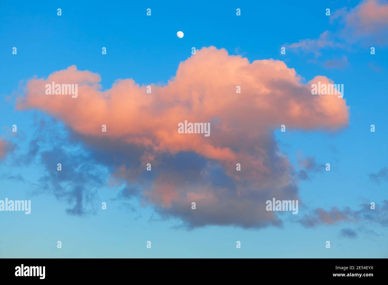 Moon over colorful cloud in the twilight Stock Photo - Alamy
