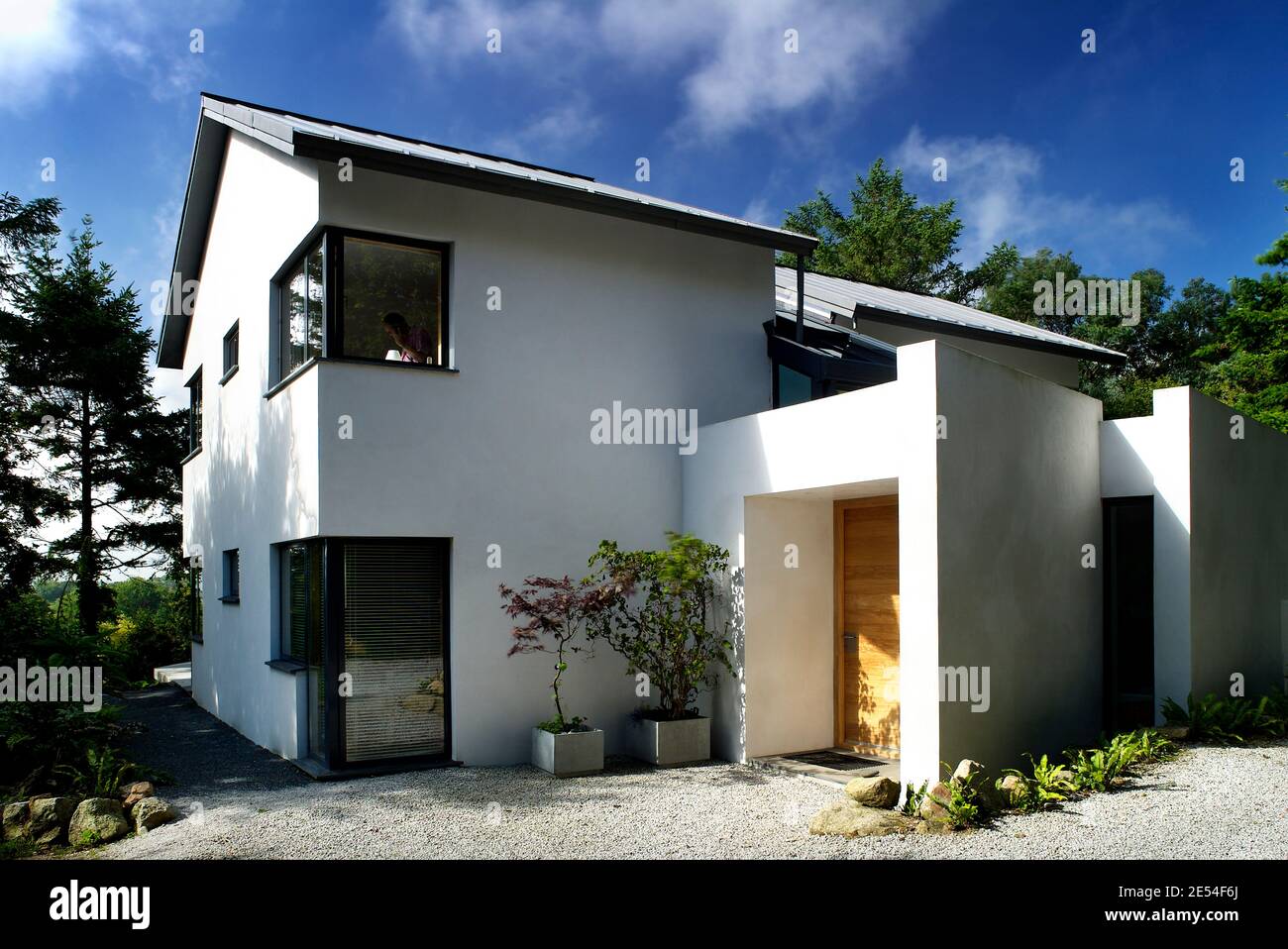 Exterior, looking to the front entrance of the house from the driveway ...