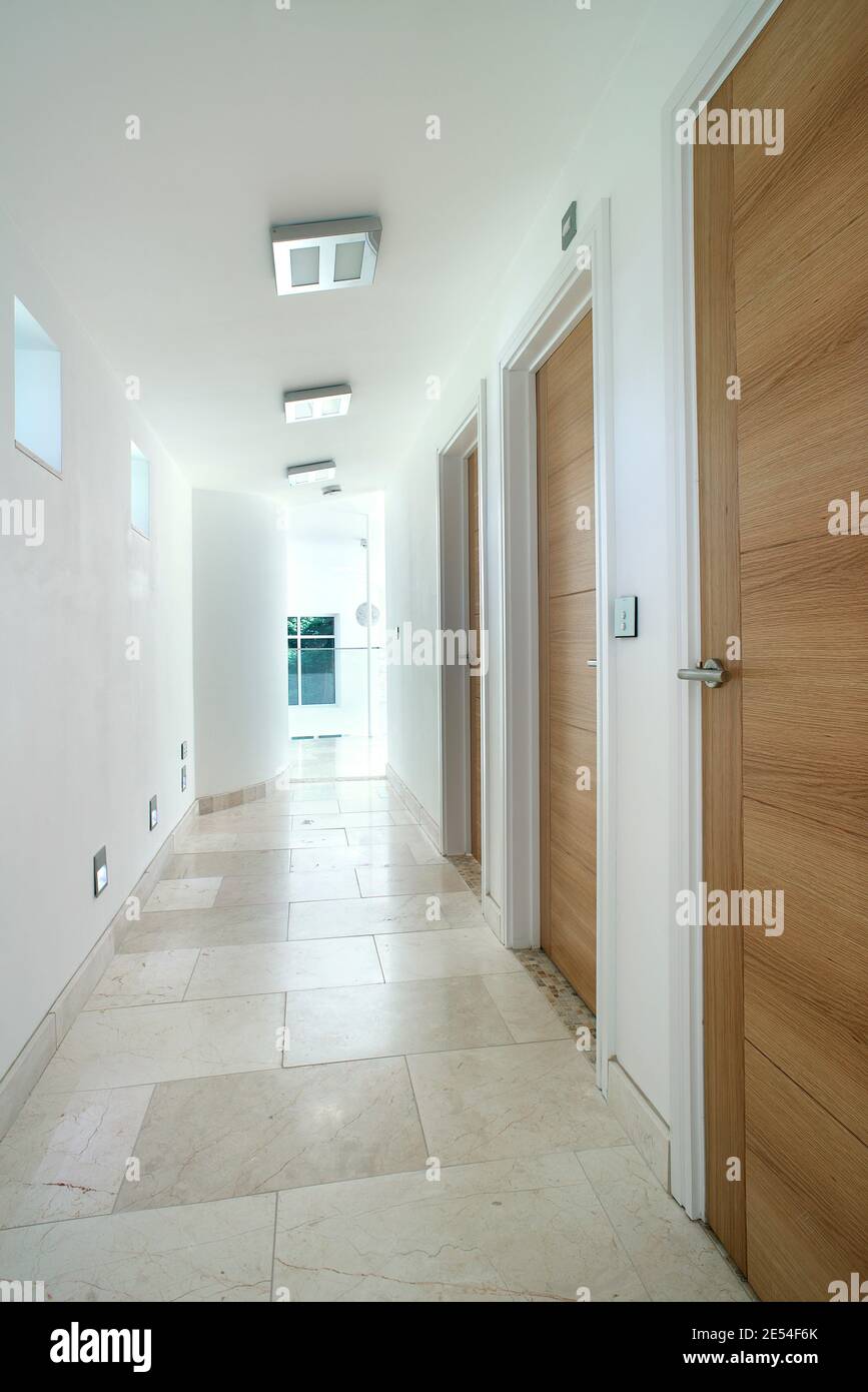 Looking along the first floor hall towards the balcony. | Architect ...