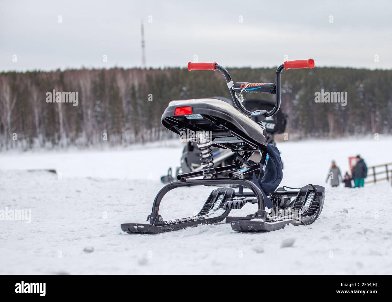 A children's snowmobile is ready for children to ride in the snow Stock ...