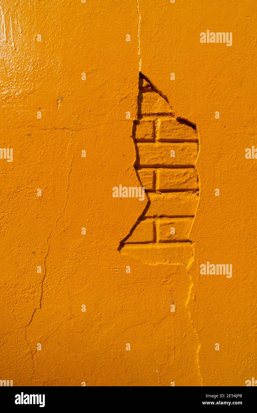 Building wall has painted in orange color at East Village NYC Stock ...