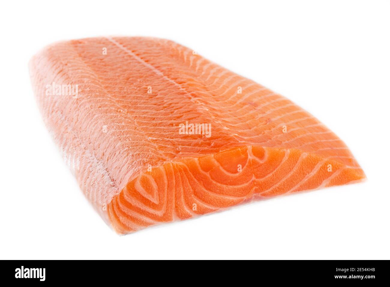 Fresh raw uncooked salmon fillet isolated on white background, side ...