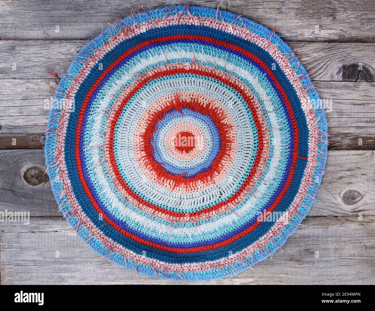 Colorful knitted mat surface with stripes Stock Photo - Alamy