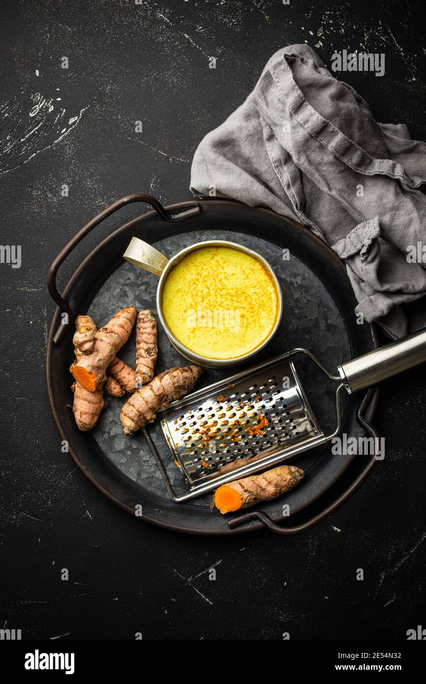 Healthy turmeric milk beverage Stock Photo - Alamy