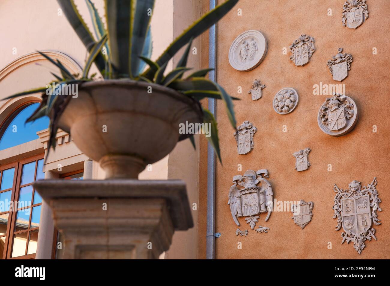 Detail of emblems inside the commercial village of Torrepueblo ...