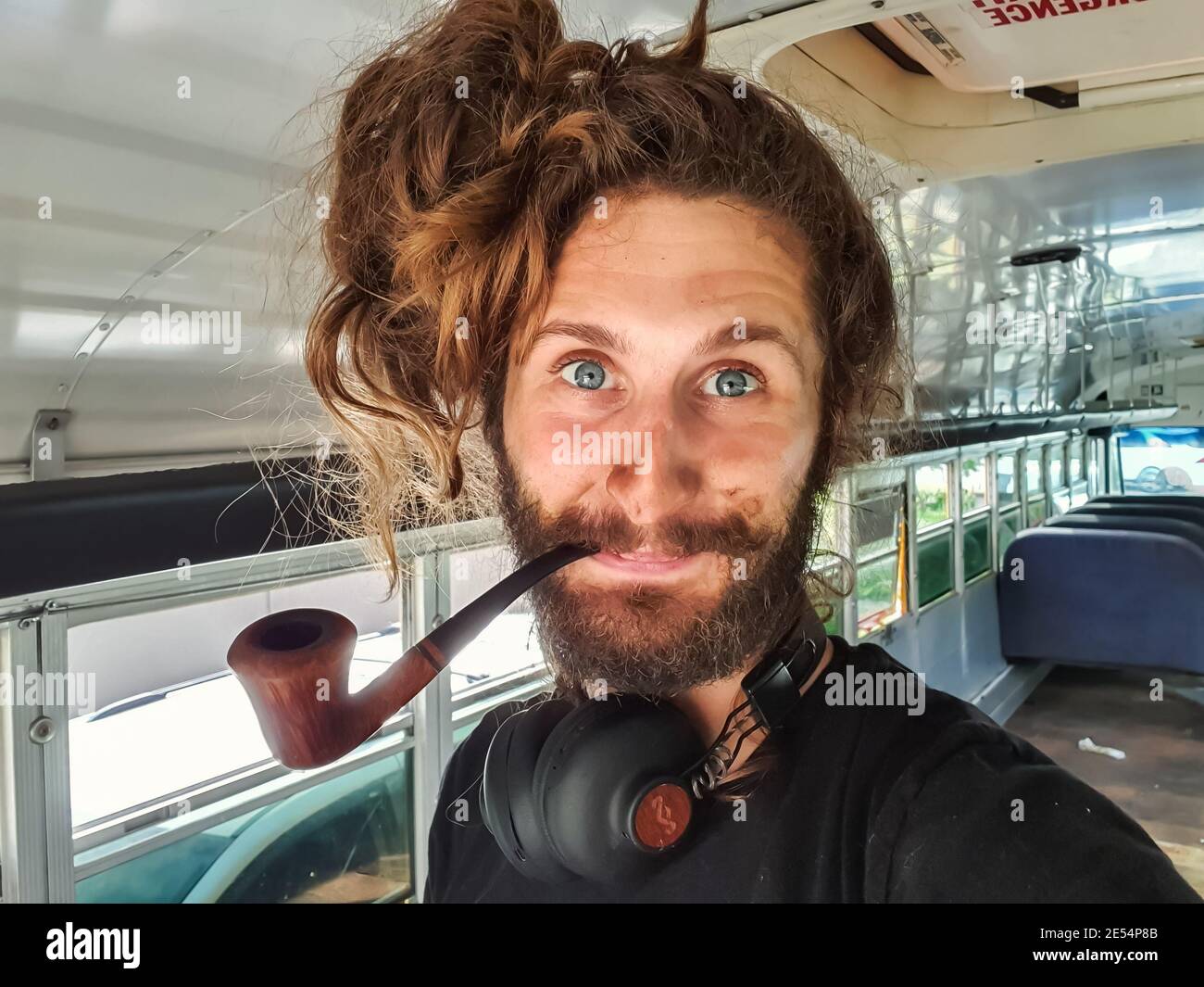 Old man smoking long pipe hi-res stock photography and images - Alamy