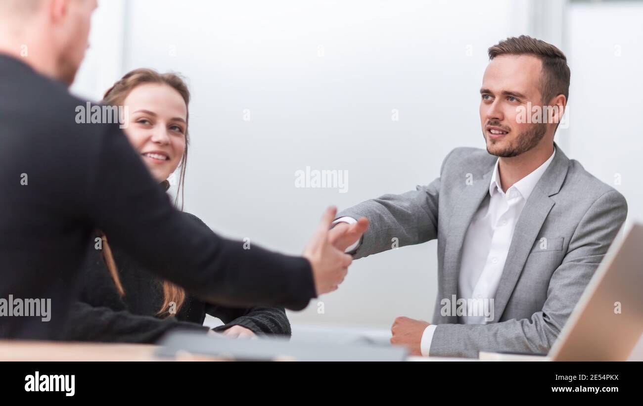 business people greeting each other with a handshake Stock Photo - Alamy