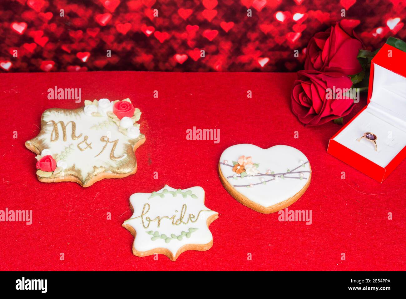 Engagment background (ring, flowers, red background Stock Photo - Alamy