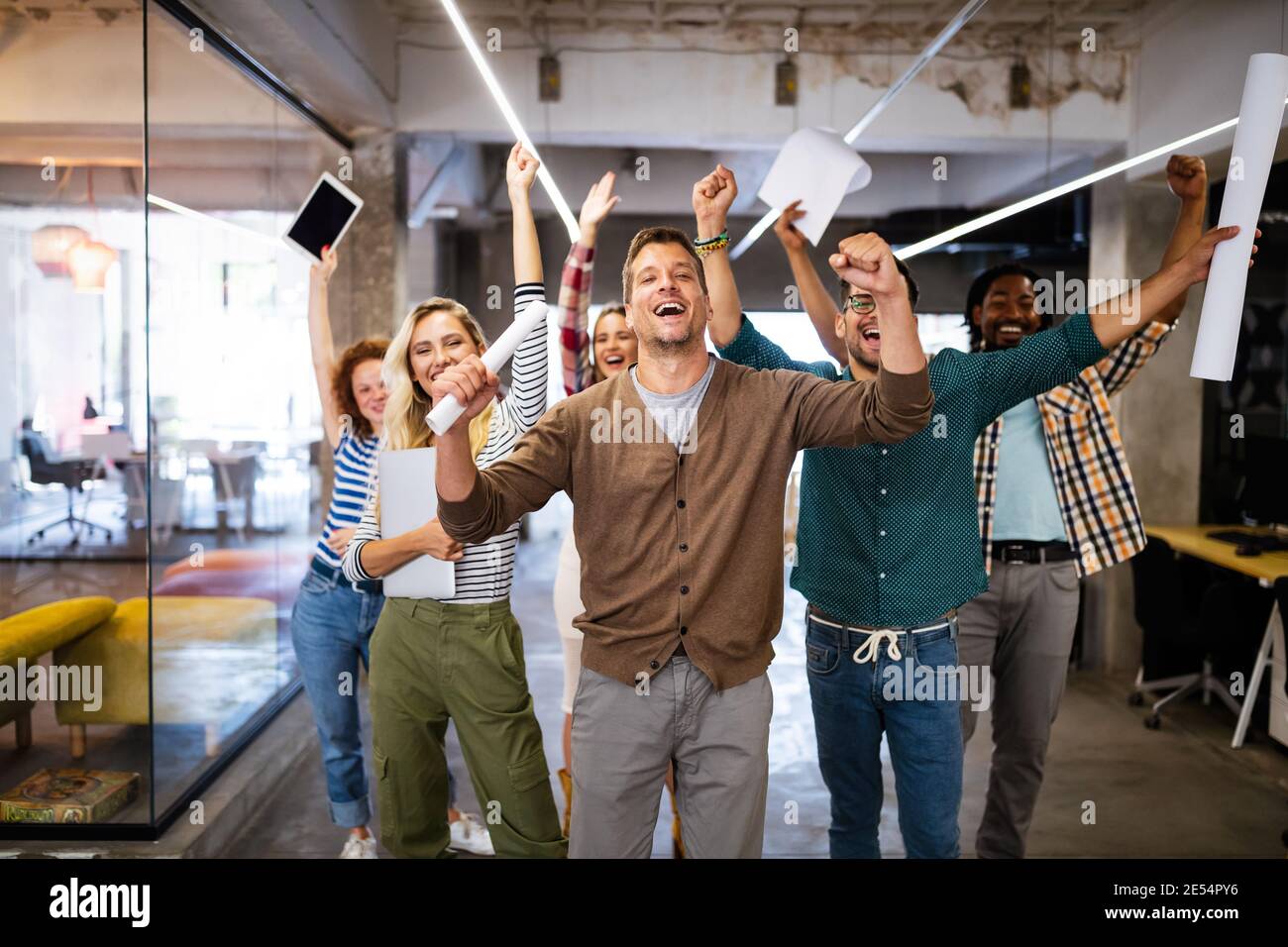 Happy businessmen colleagues friends male hi-res stock photography and ...