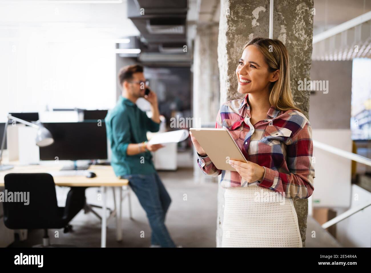 Happy creative team in office. Business, startup, design, people and ...