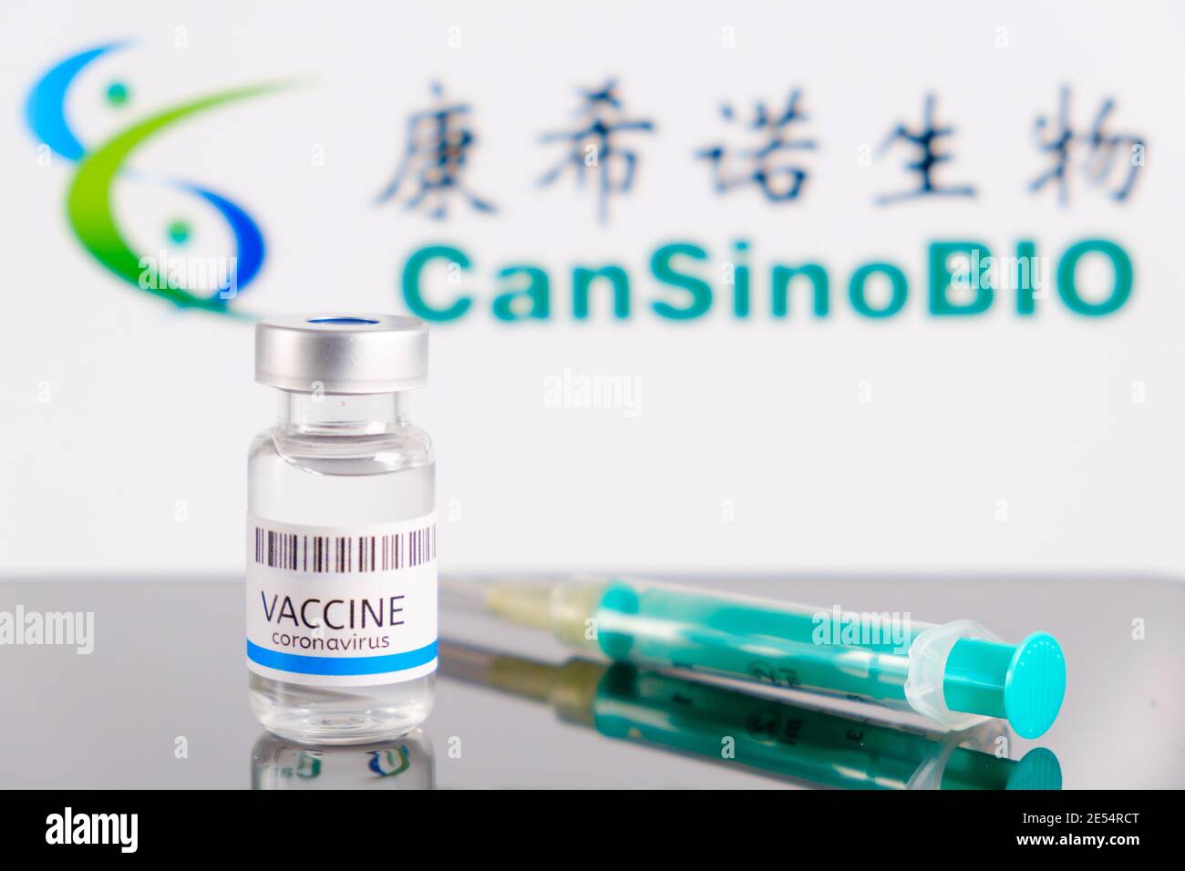 CanSinoBIO logo on the background of bottle or vial with vaccine and ...