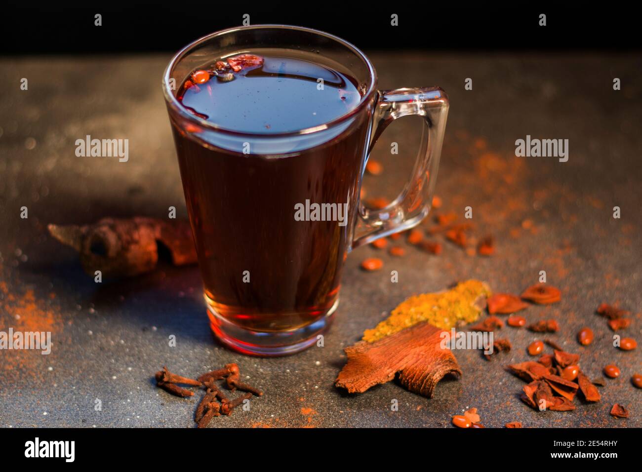Rome with tea, Grog on the black background Stock Photo - Alamy