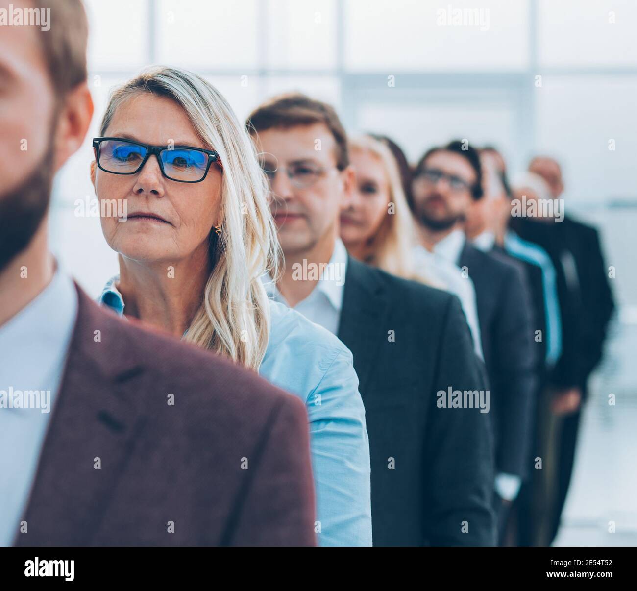 close up. group of frustrated employees standing in the office Stock ...