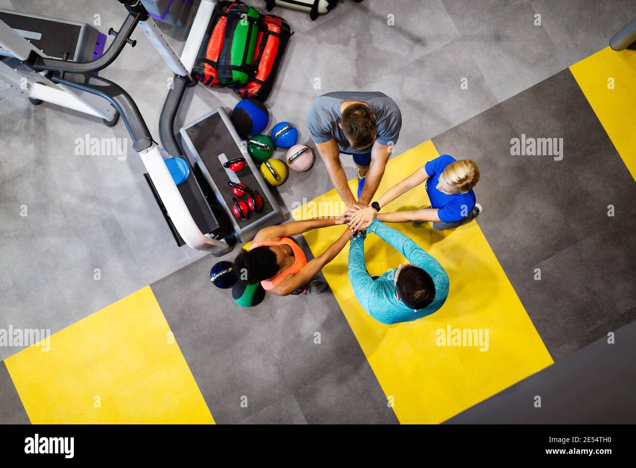 Fit people working out in fitness class at the gym Stock Photo - Alamy