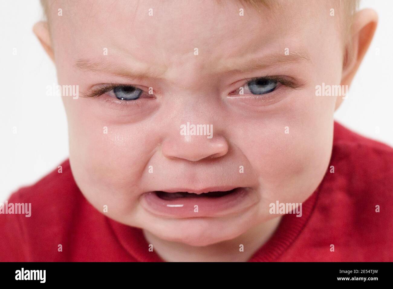Crying baby girl 8 months hi-res stock photography and images - Alamy