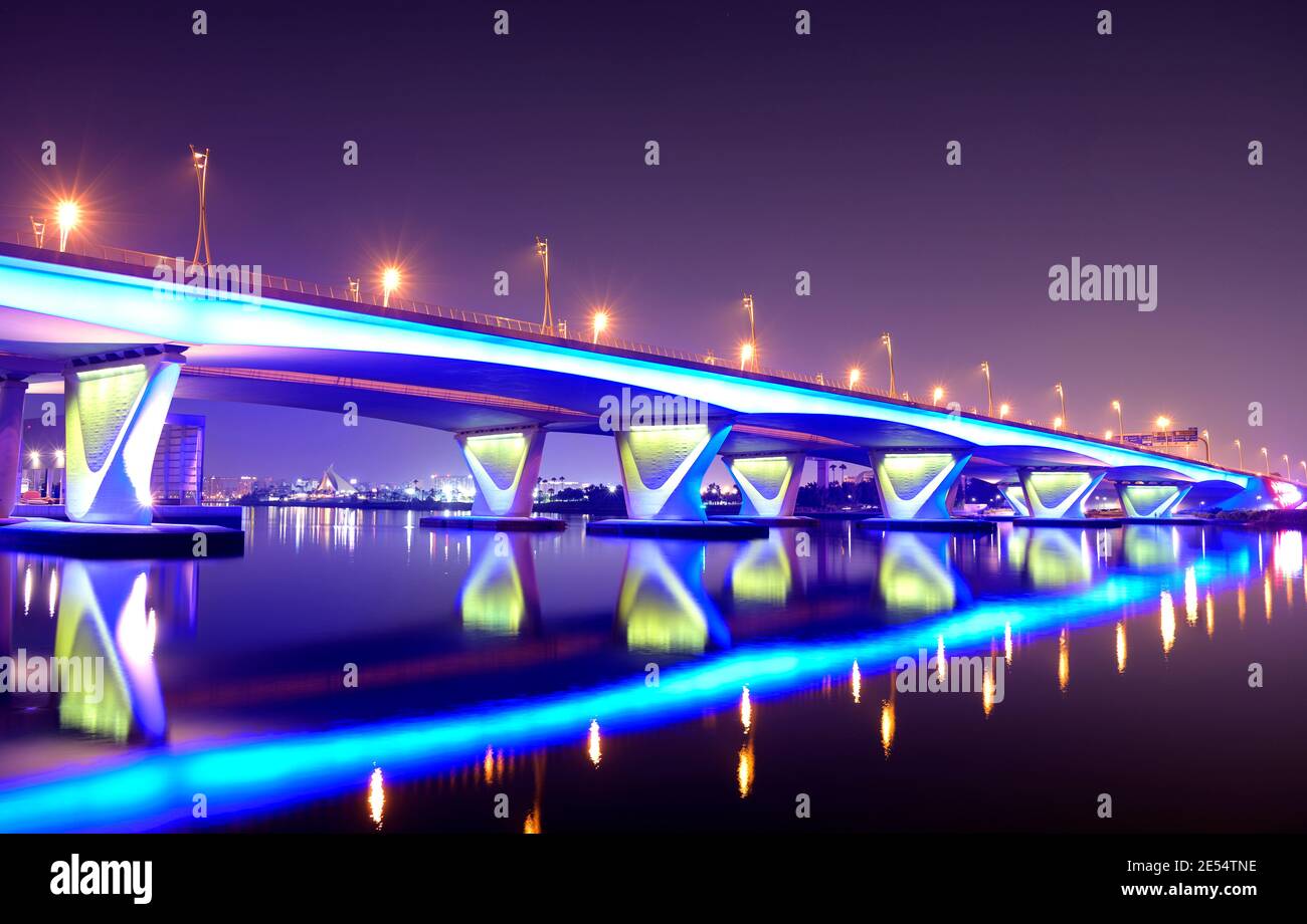 Beautiful winter night view of the Blue illuminated Al Garhoud Bridge ...
