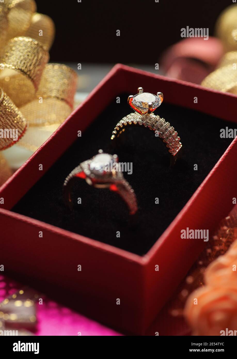 The anniversary diamond rings in the red box Stock Photo - Alamy