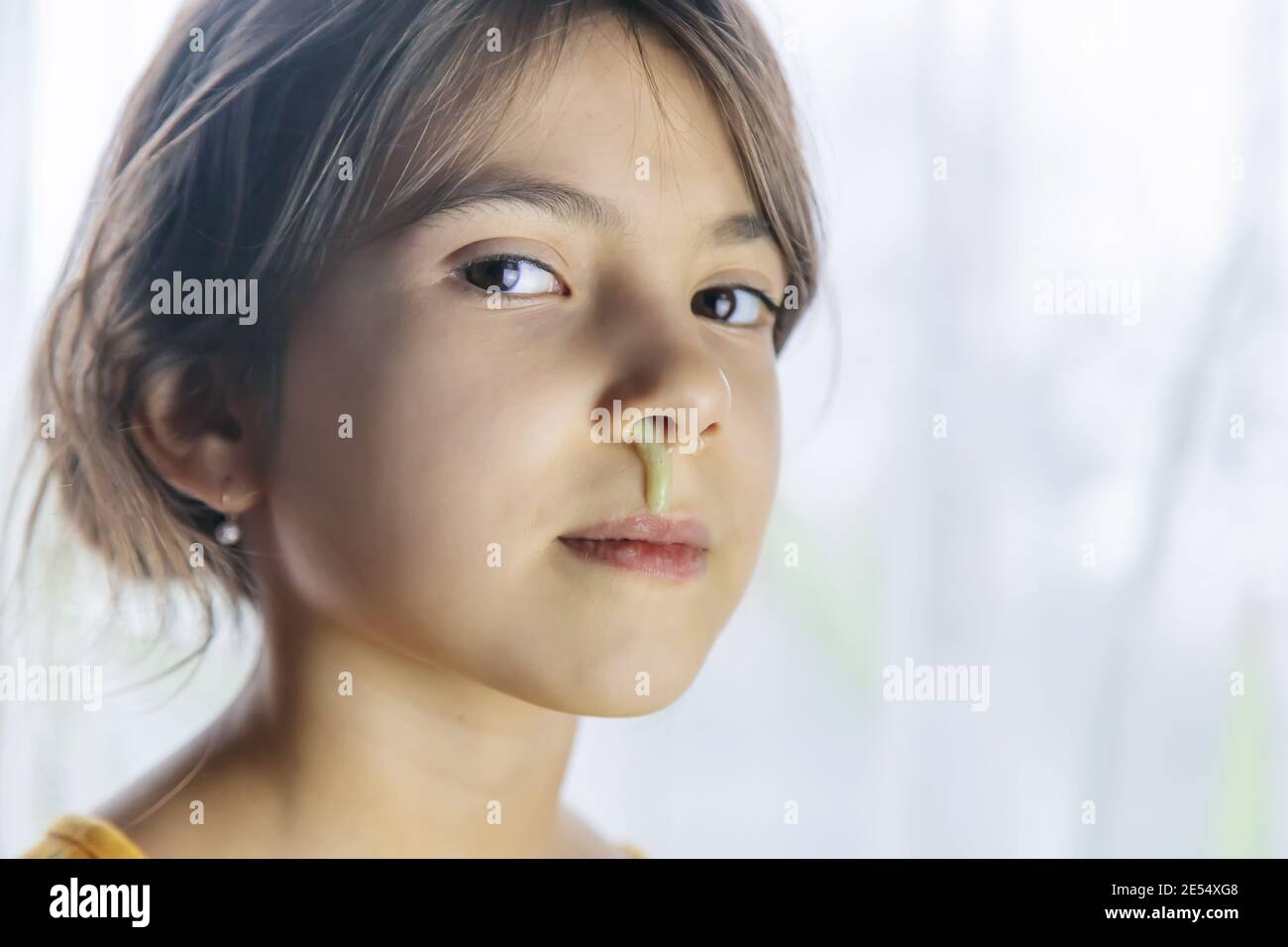 Snot in a child face close-up. Cold. Selective focus. People Stock ...