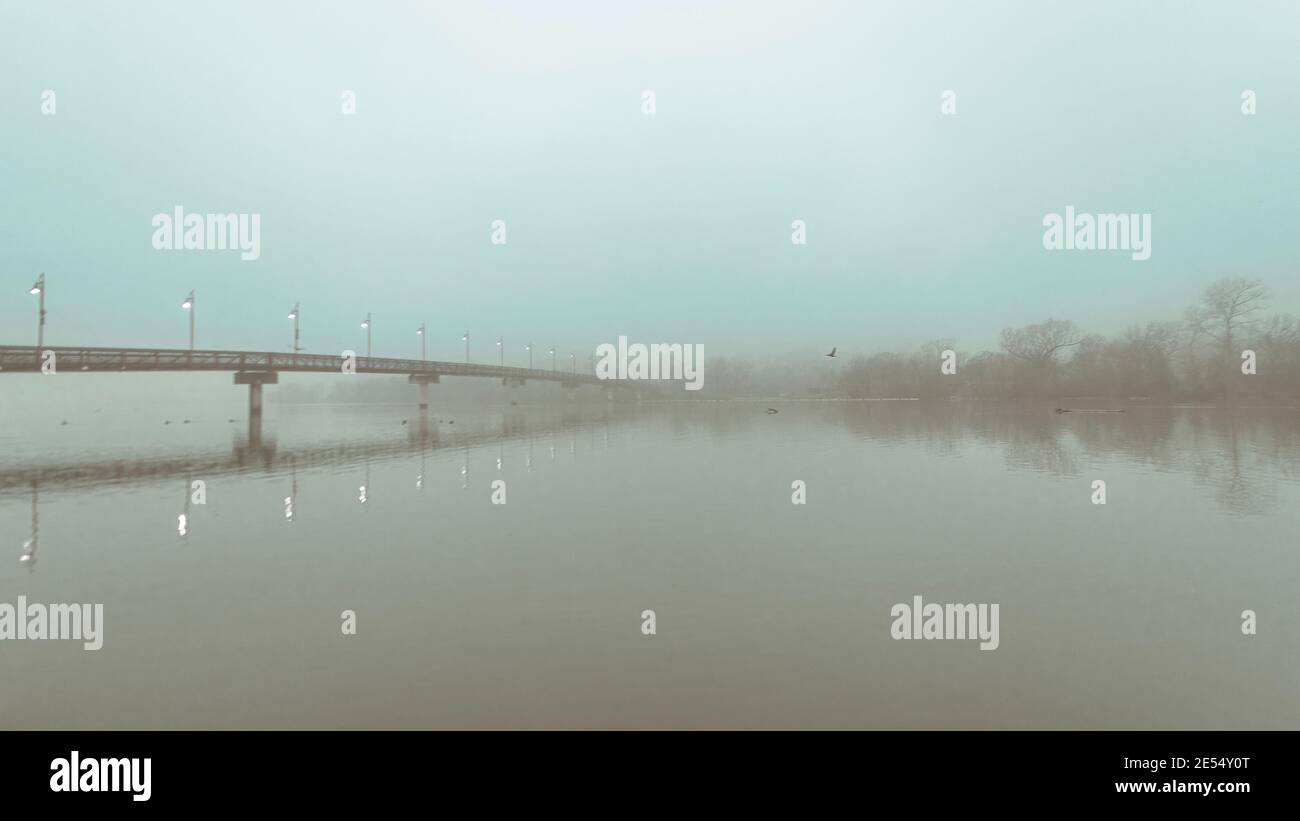 Foggy dock lake boats hi-res stock photography and images - Alamy