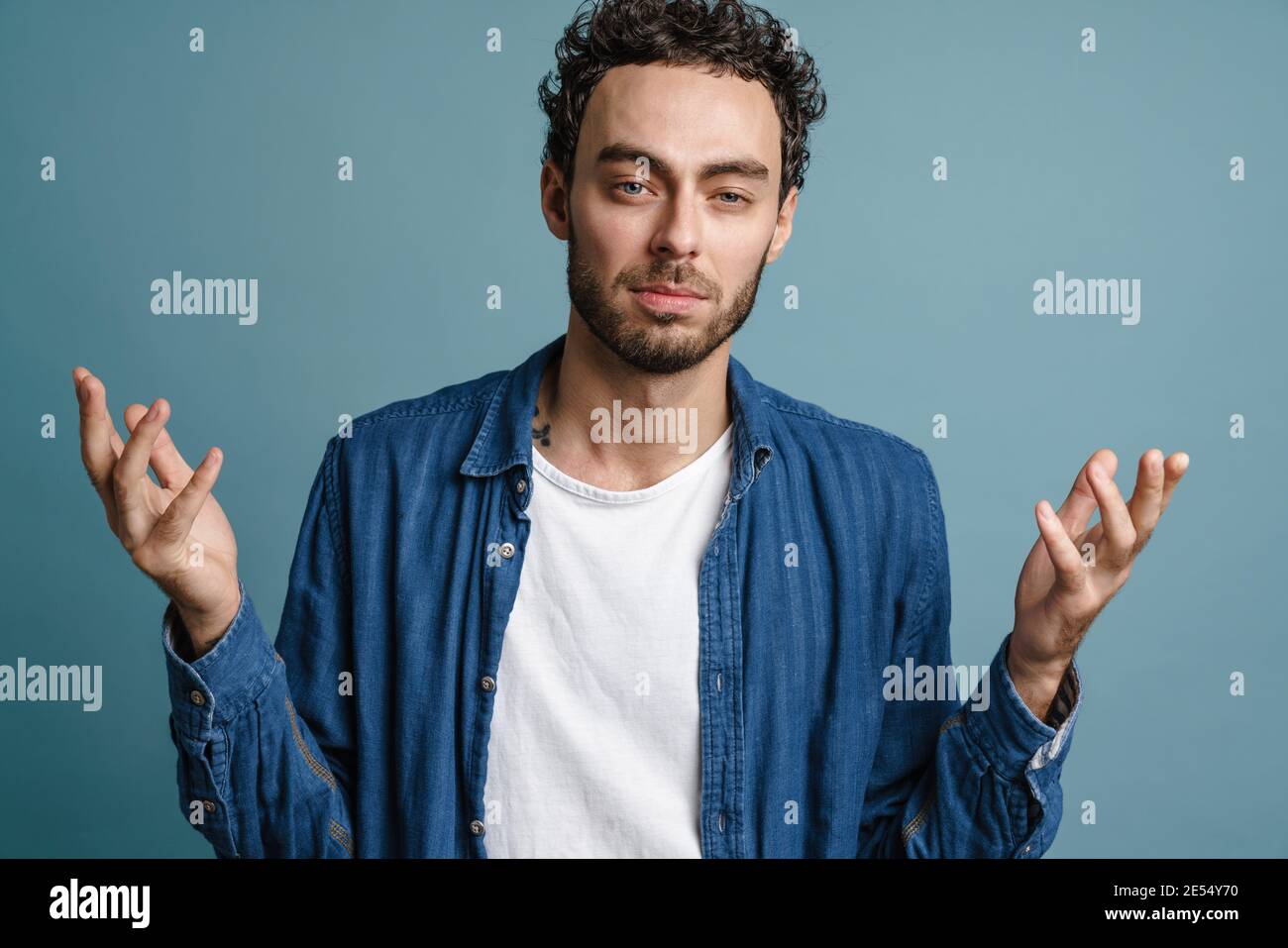 Man looking confused hands up hi-res stock photography and images - Alamy