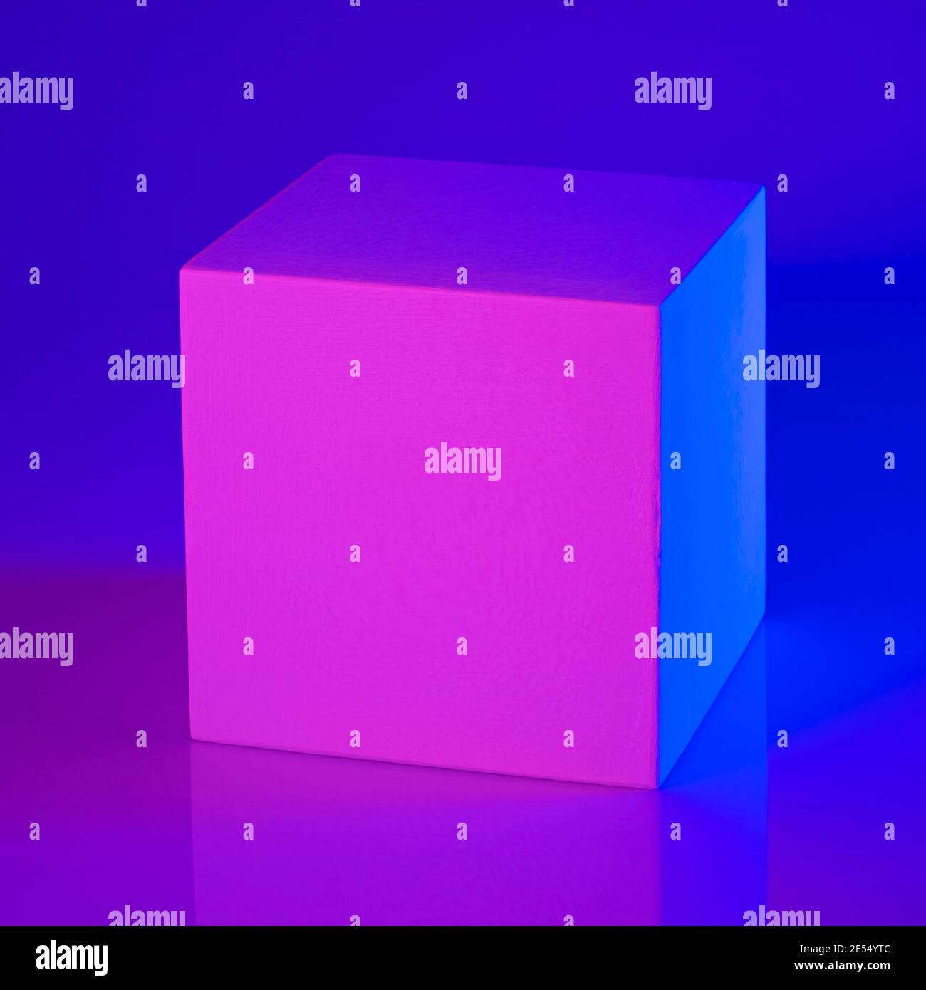 Gypsum cube in pink and blue neon light Stock Photo - Alamy