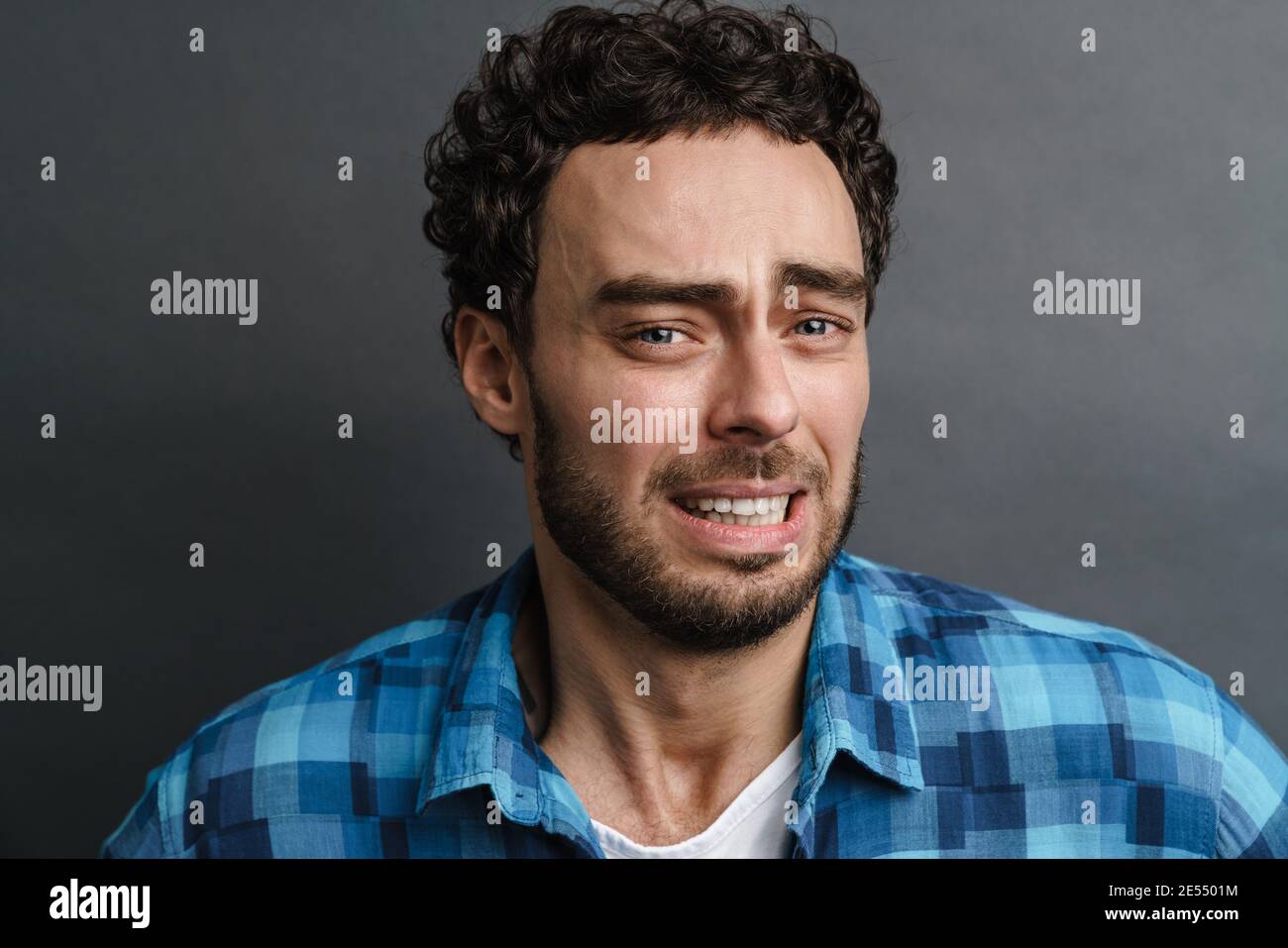 Caucasian scared guy posing hi-res stock photography and images - Alamy