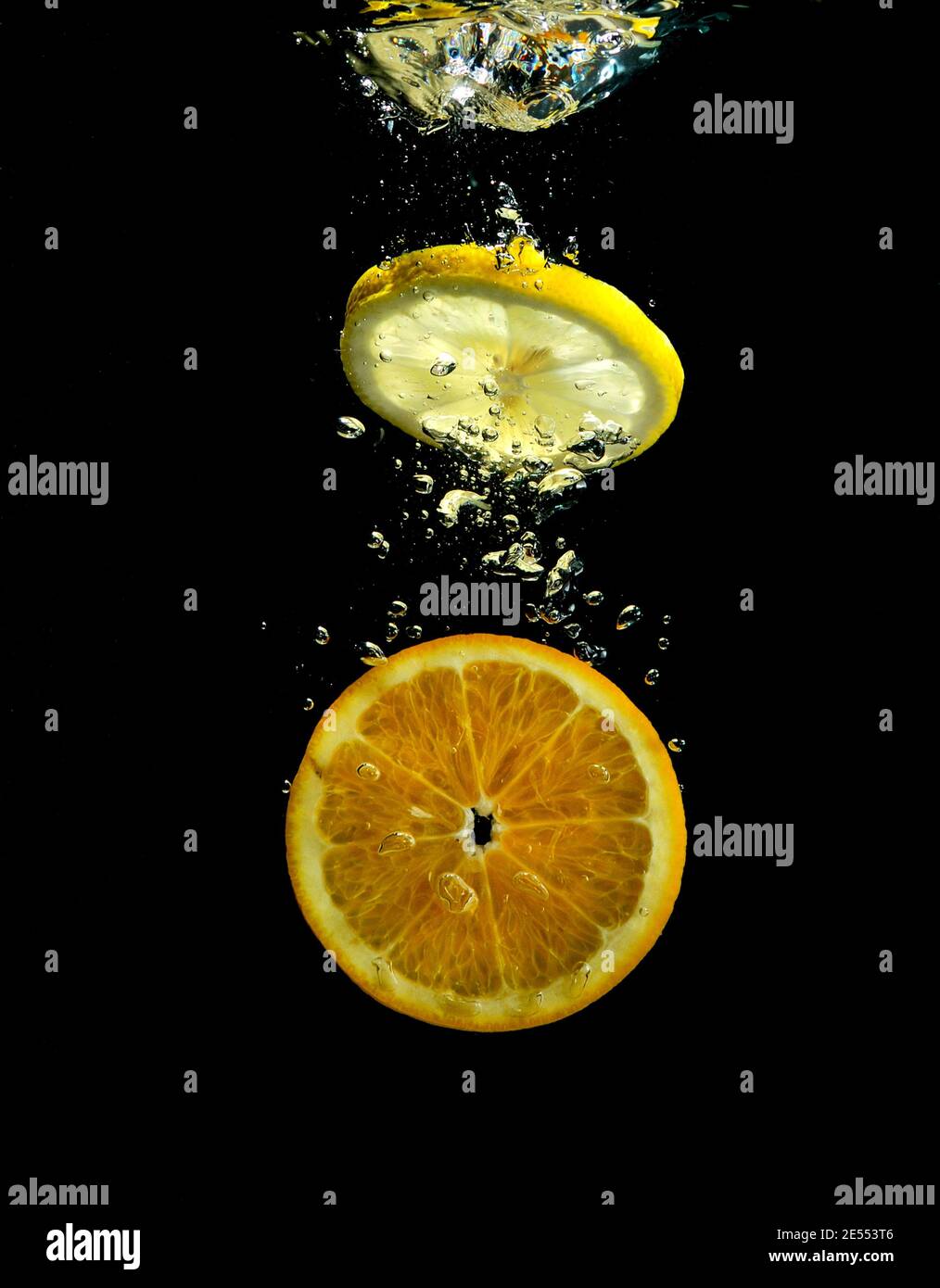 Orange lemon slices falling water hi-res stock photography and images - Alamy