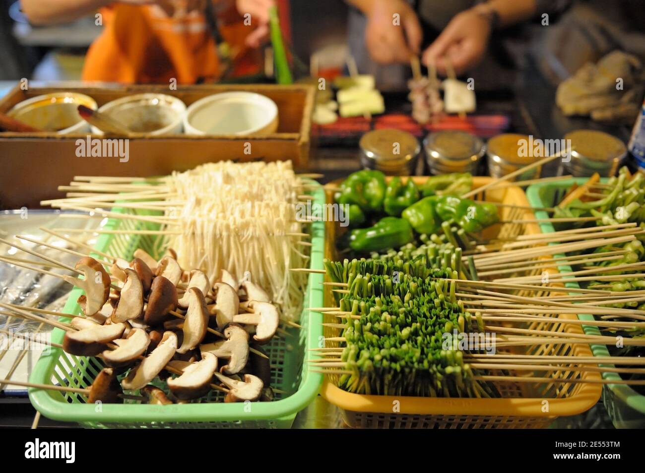 Street restaurant in China, Shanghai. People preparing vegetable ...