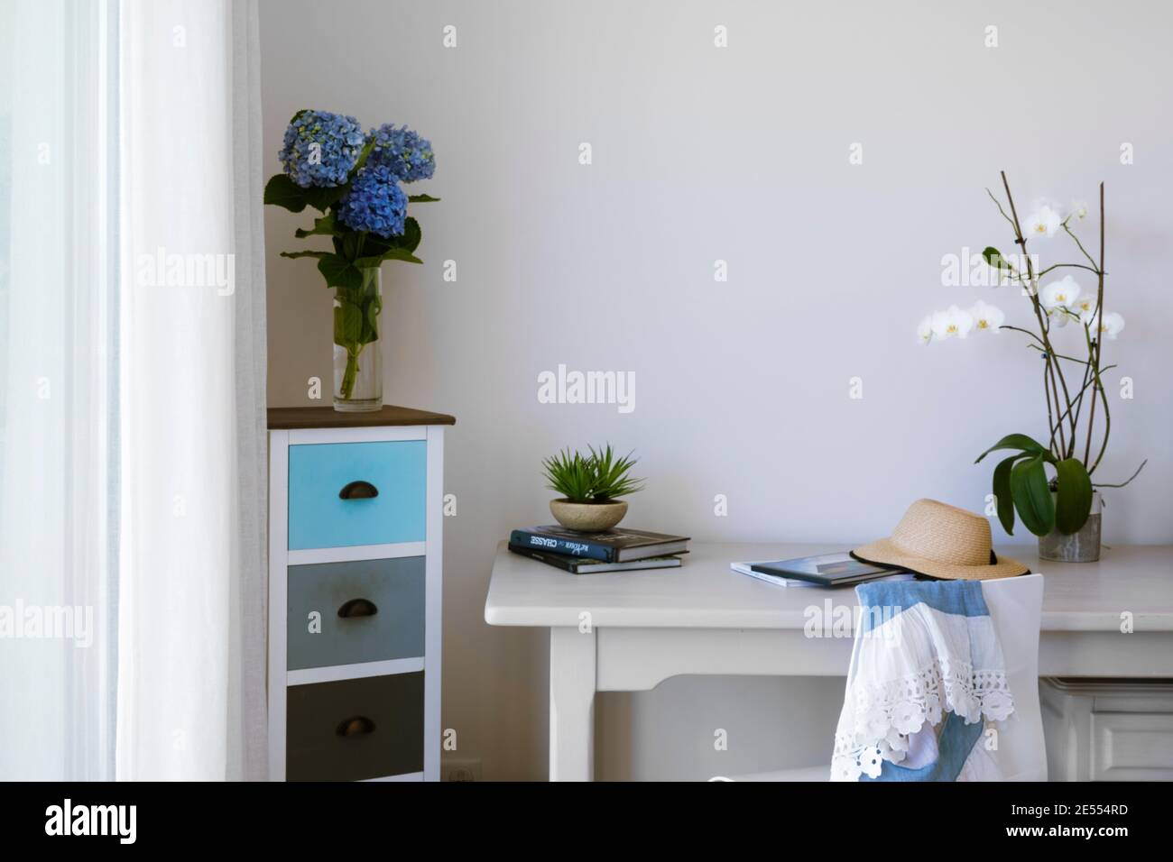 Interior desk and chair with hydrangea flower blue and white Stock ...