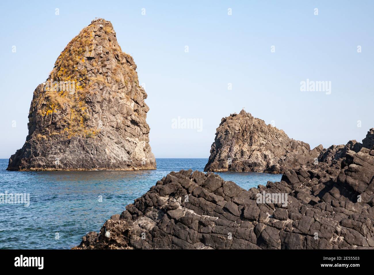 The Islands of the Cyclops at the coast of Aci Trezza, Sicily, Italy ...