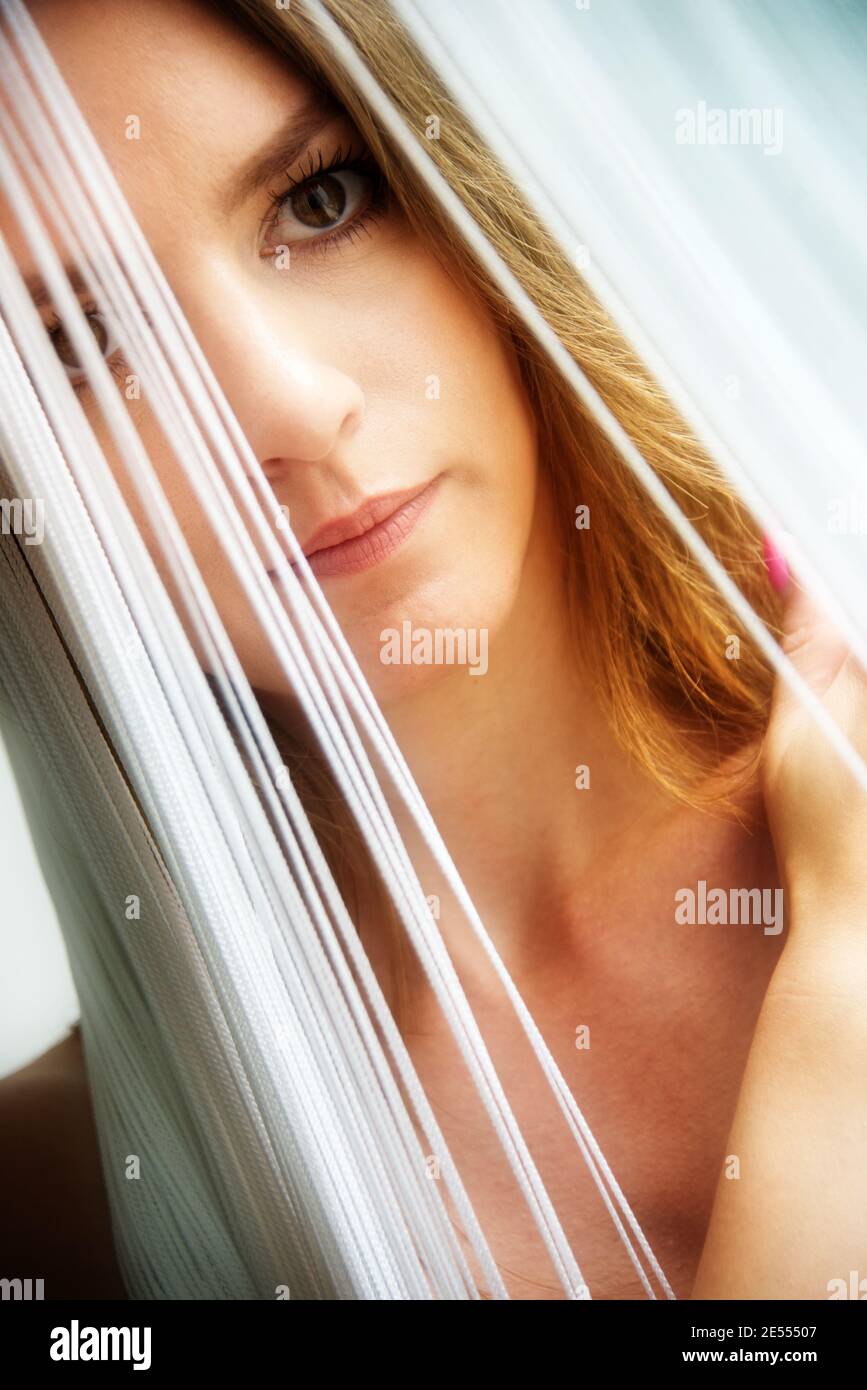 colored portrait of a young beautiful attractive woman, slanted, which ...